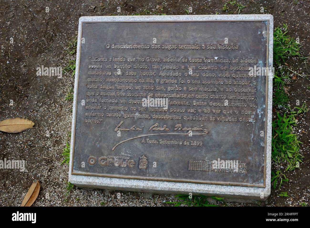 Metal plaque describing the discovery of the thermal spring waters ...