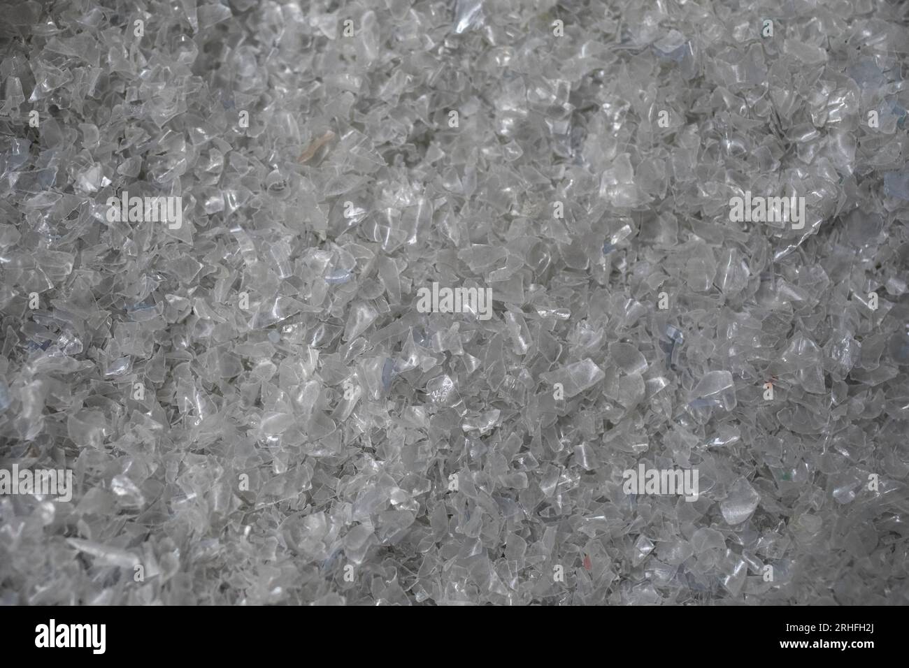 Flakes of crushed plastic bottles as raw material for further ...
