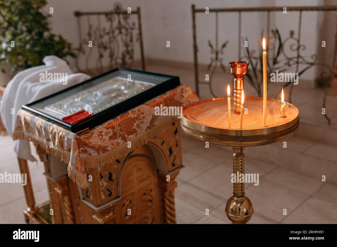 Priest anointing child hi-res stock photography and images - Alamy
