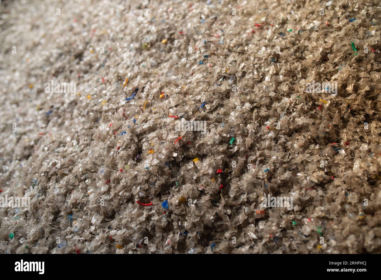 Flakes of crushed plastic bottles as raw material for further ...