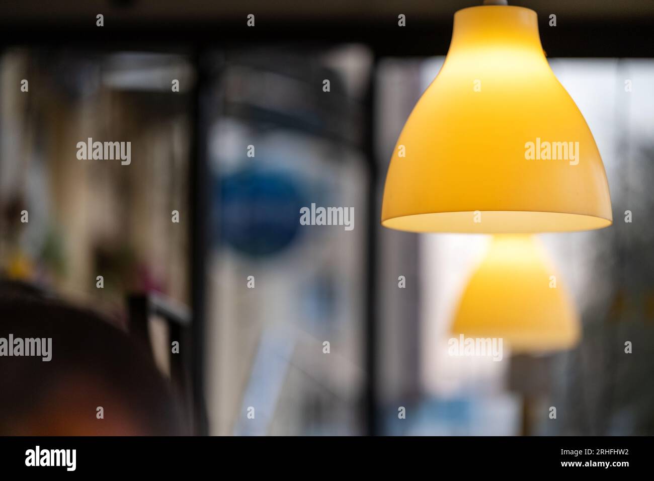 A row of lamps in the interior of the restaurant. Modern lighting ...