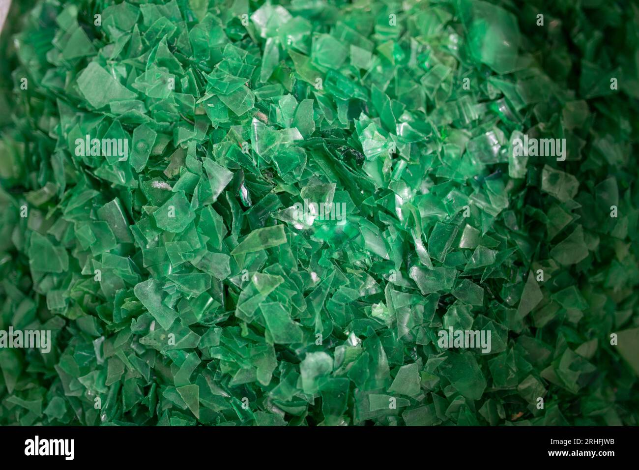 Flakes of crushed plastic bottles as raw material for further ...