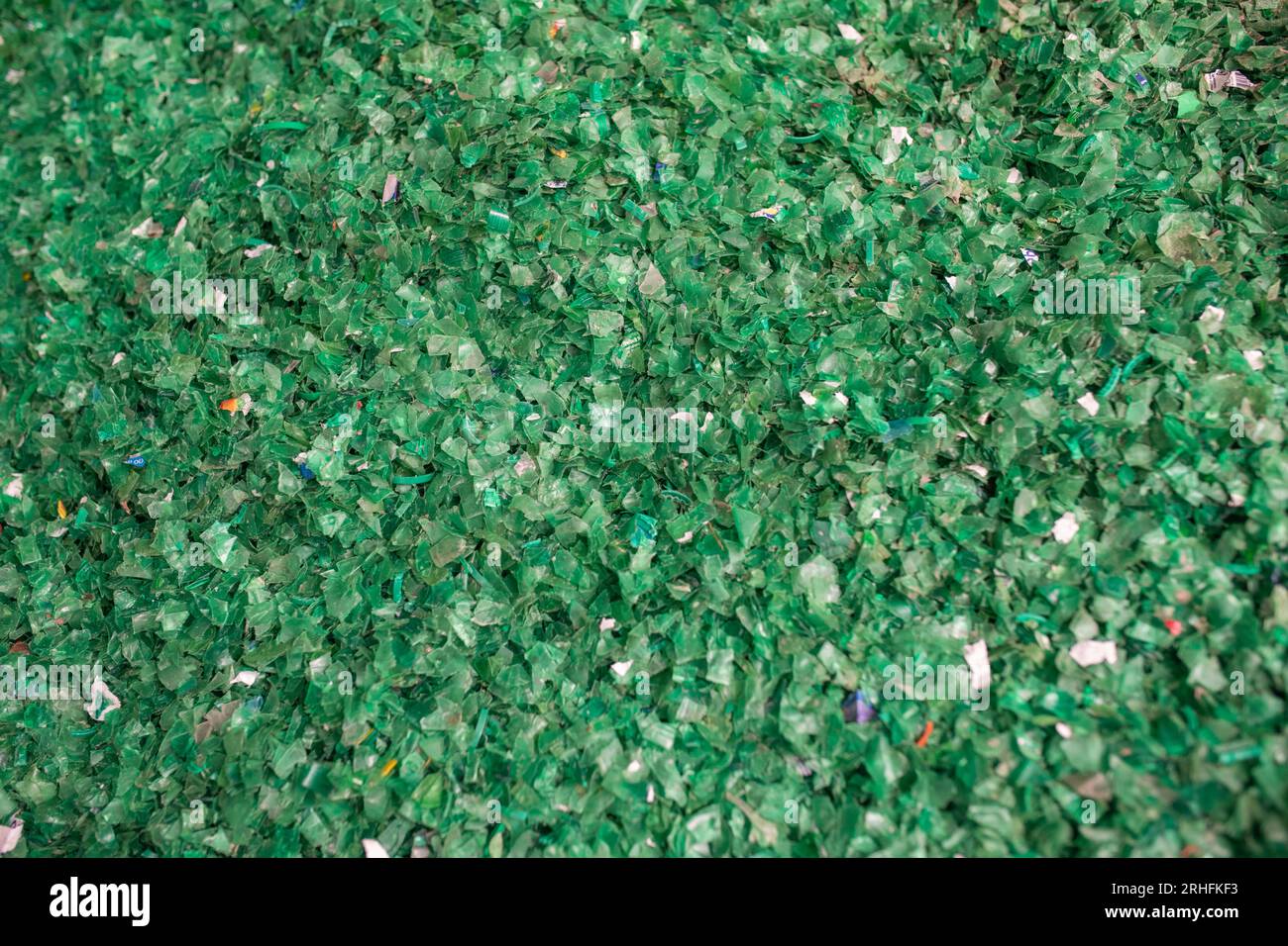 Flakes of crushed plastic bottles as raw material for further ...