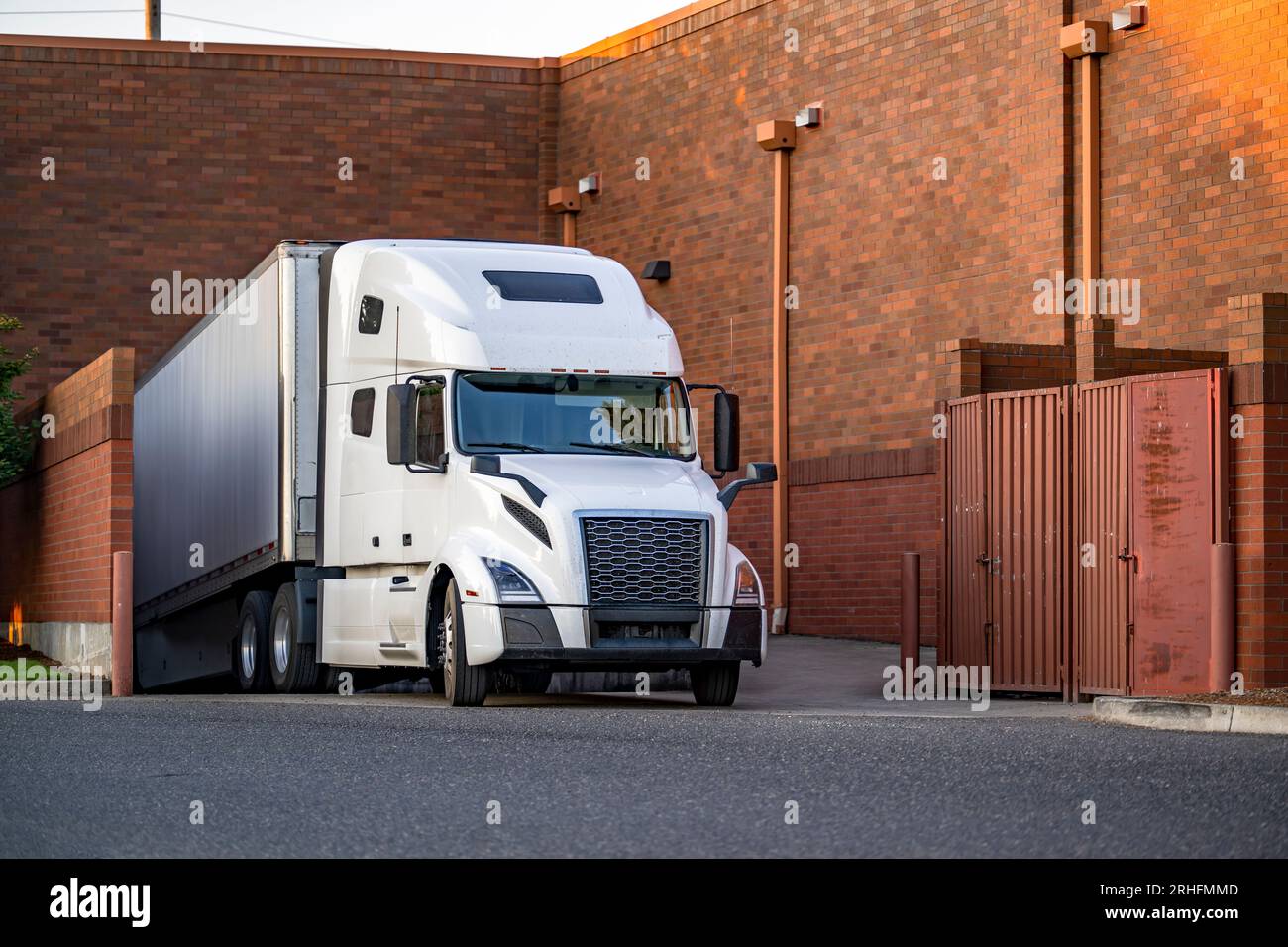 Bonnet powerful industrial big rig semi truck tractor unloading ...