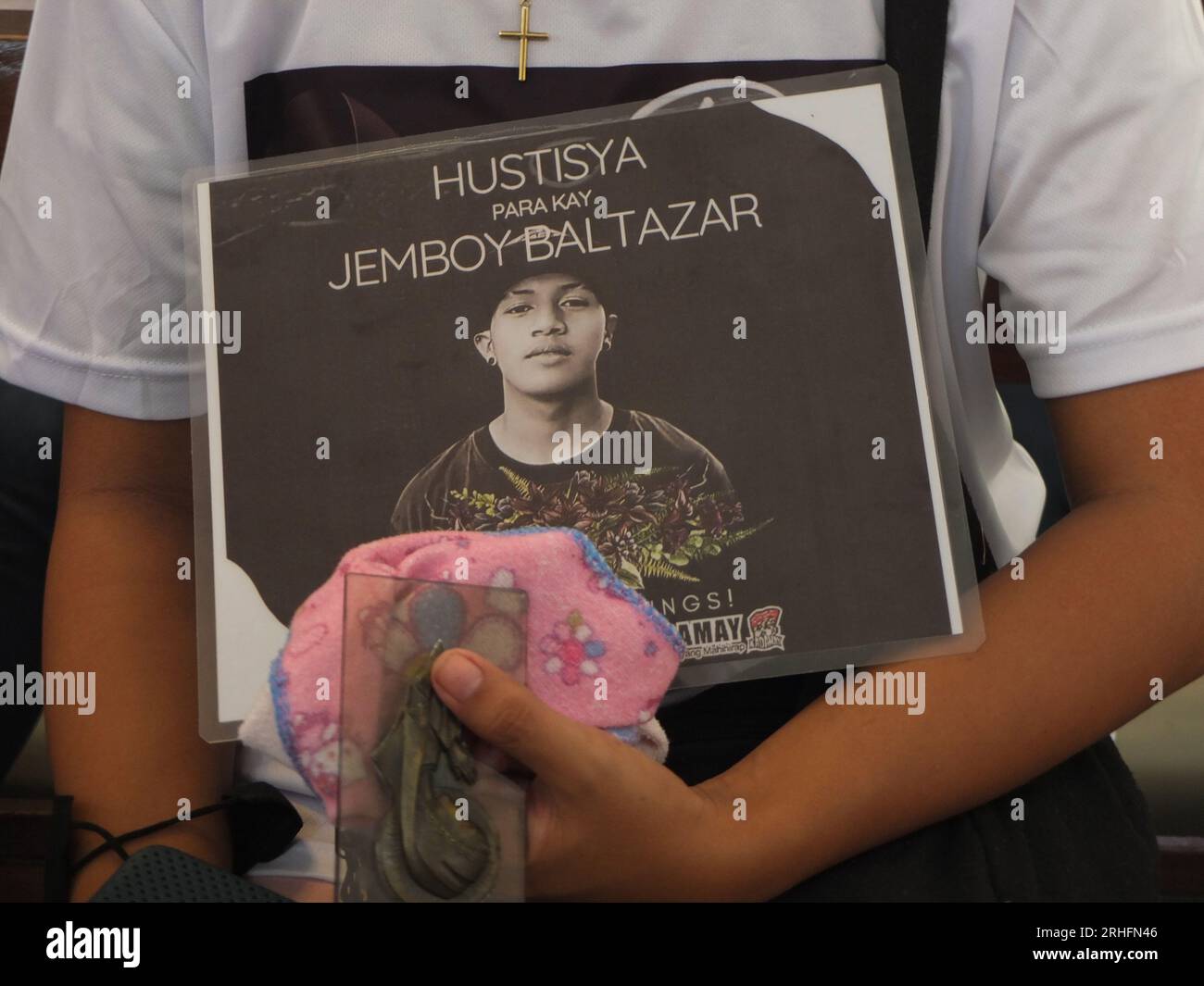 Caloocan, Philippines. 16th Aug, 2023. A relative holds Jemboy Baltazar ...