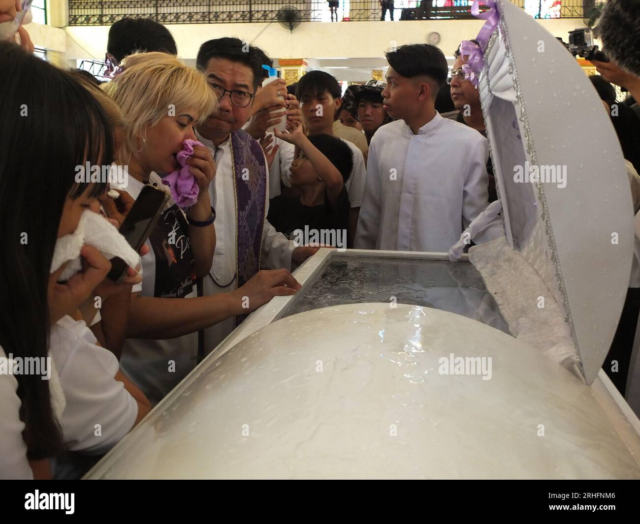 Caloocan, Philippines. 16th Aug, 2023. Rodaliza Baltazar, mother of Jemboy seen trying to hold ...