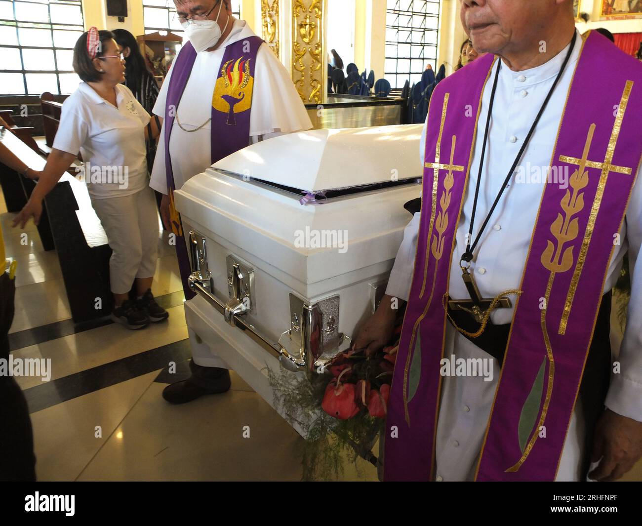 Caloocan, Philippines. 16th Aug, 2023. Priests carry the casket of ...