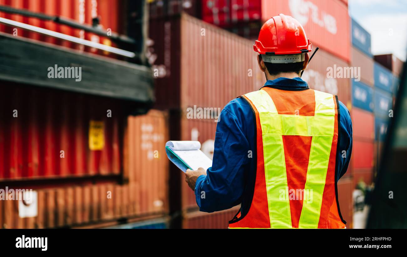 Warehouse engineer worker working at industrial container yard Stock ...