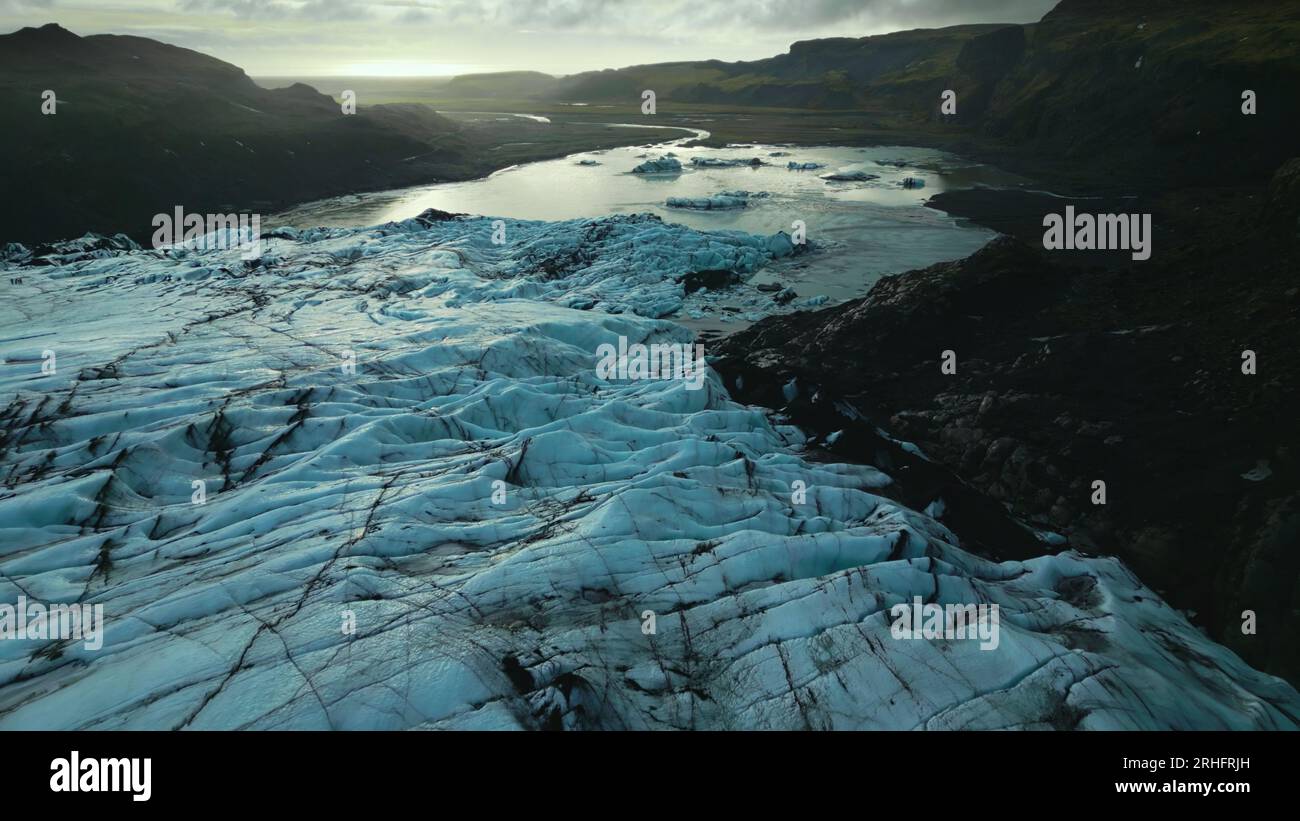 Aerial view of huge ice on frozen lake, massive icy rocks floating ...