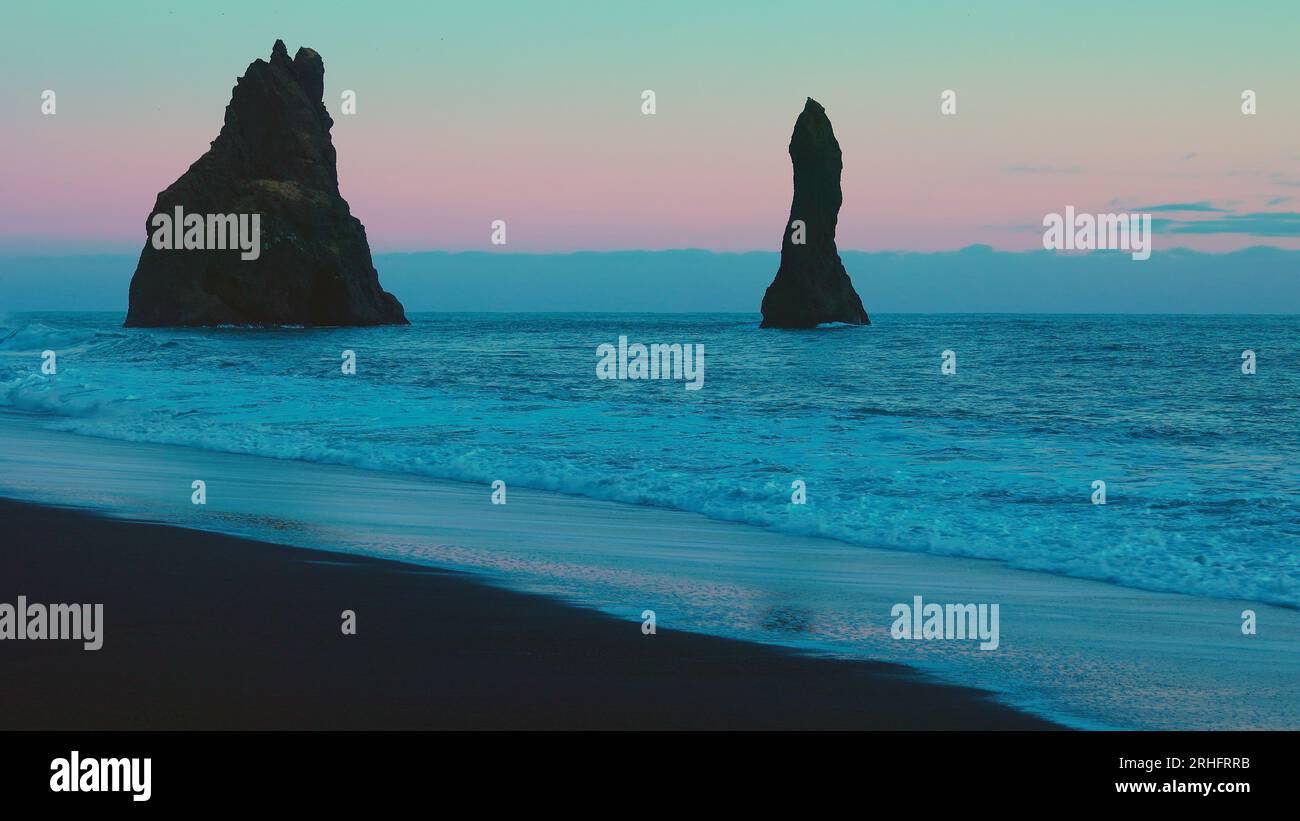 Atlantic shore with majestic rocks on reynisfjara beach and reynisfjall ...
