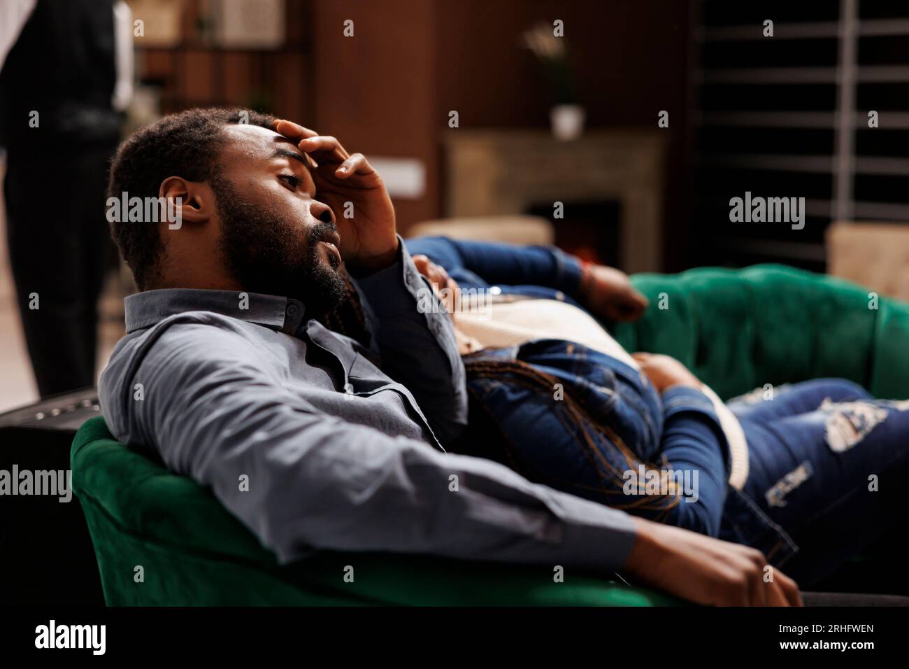 Tired sleepy man traveler feeling exhausted, suffering from headache ...