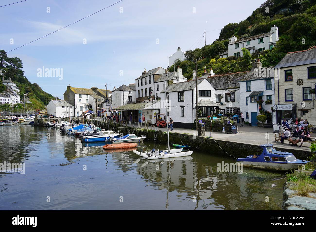Polperro, UK - August 2023: The inner harbour of historical fishing ...