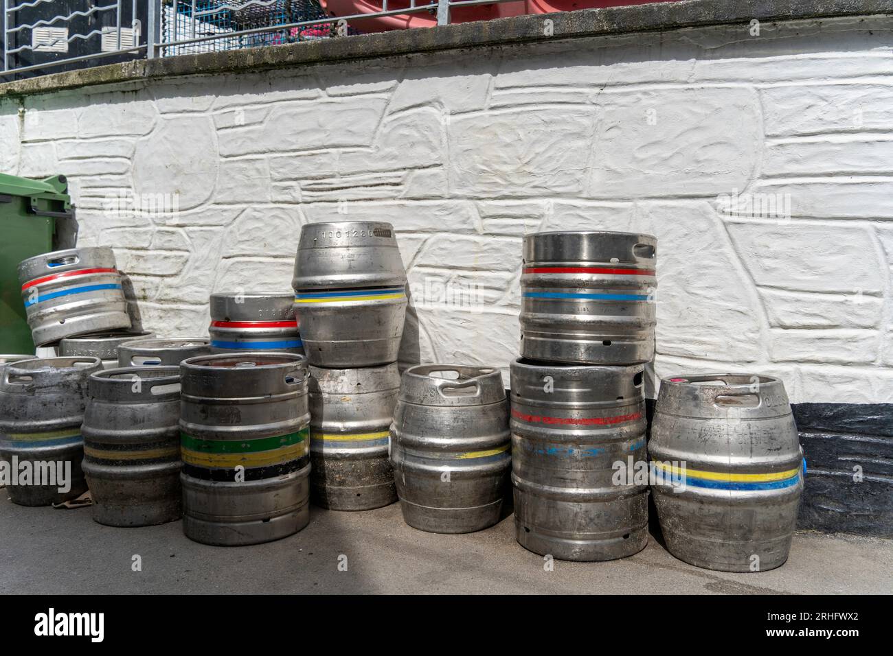 Metal beer kegs, brewery and pub barrels by the wall Stock Photo - Alamy