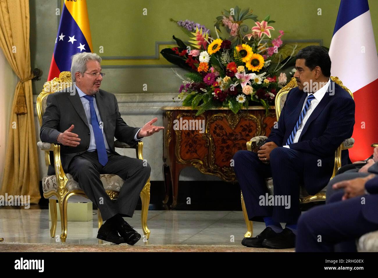 France's new ambassador to Venezuela, Emmanuel Pineda, left, speaks ...