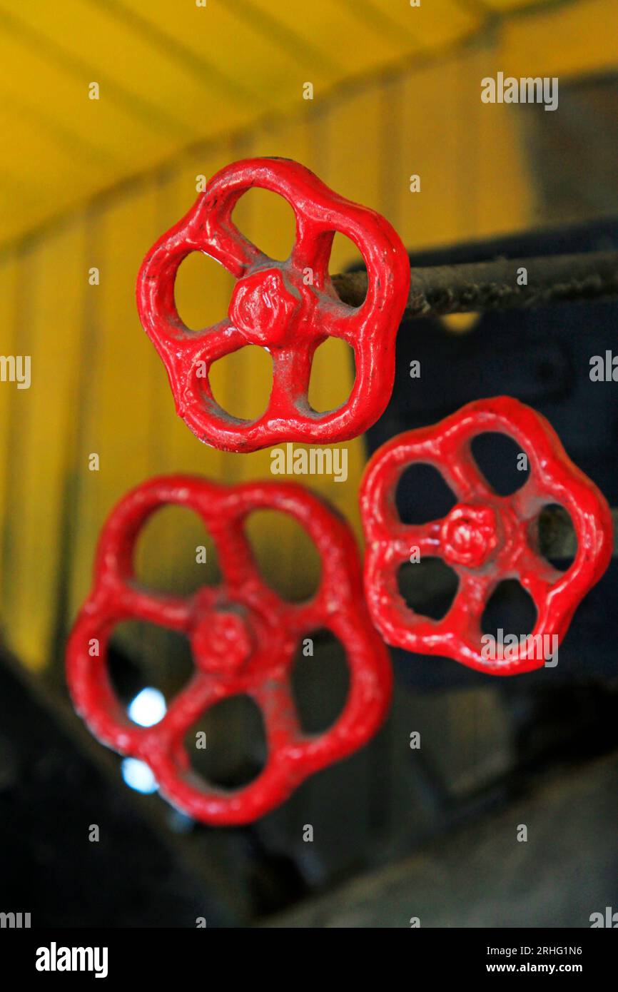 Red hand control valve, closeup of photo Stock Photo - Alamy