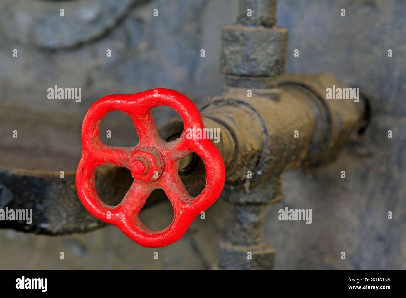 Red hand control valve, closeup of photo Stock Photo - Alamy
