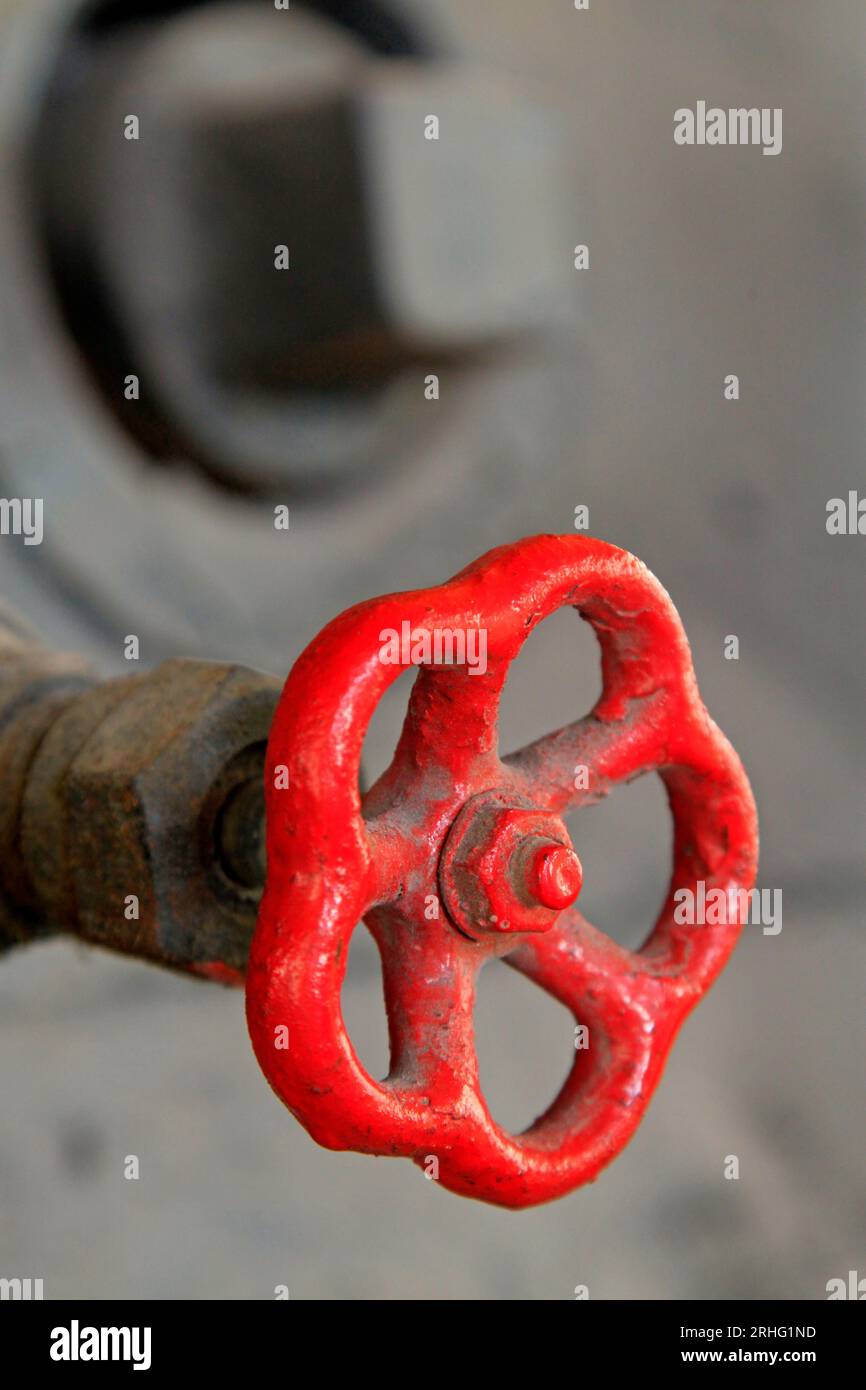 Red hand control valve, closeup of photo Stock Photo - Alamy