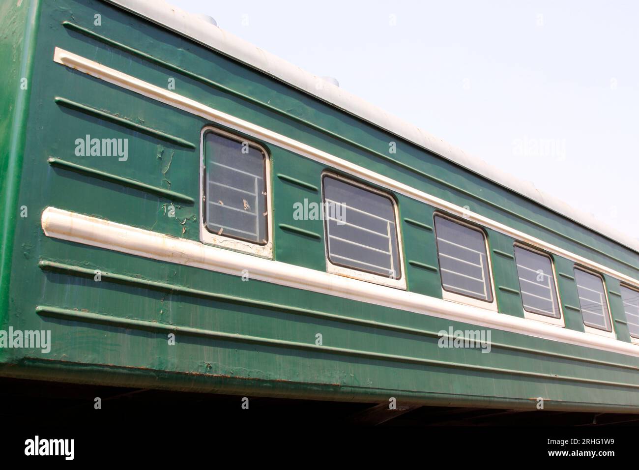 closeup of green train cars in a station Stock Photo - Alamy