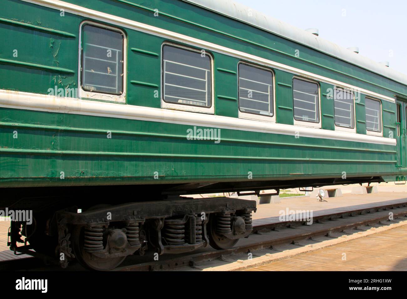 closeup of green train cars in a station Stock Photo - Alamy