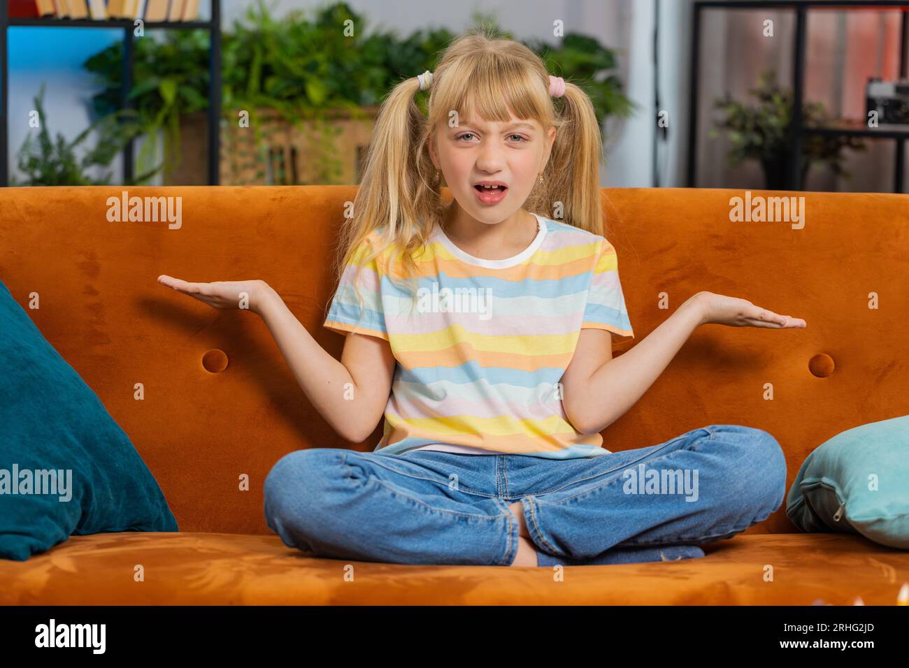 What. Why. Young child kid girl raising hands in indignant expression ...