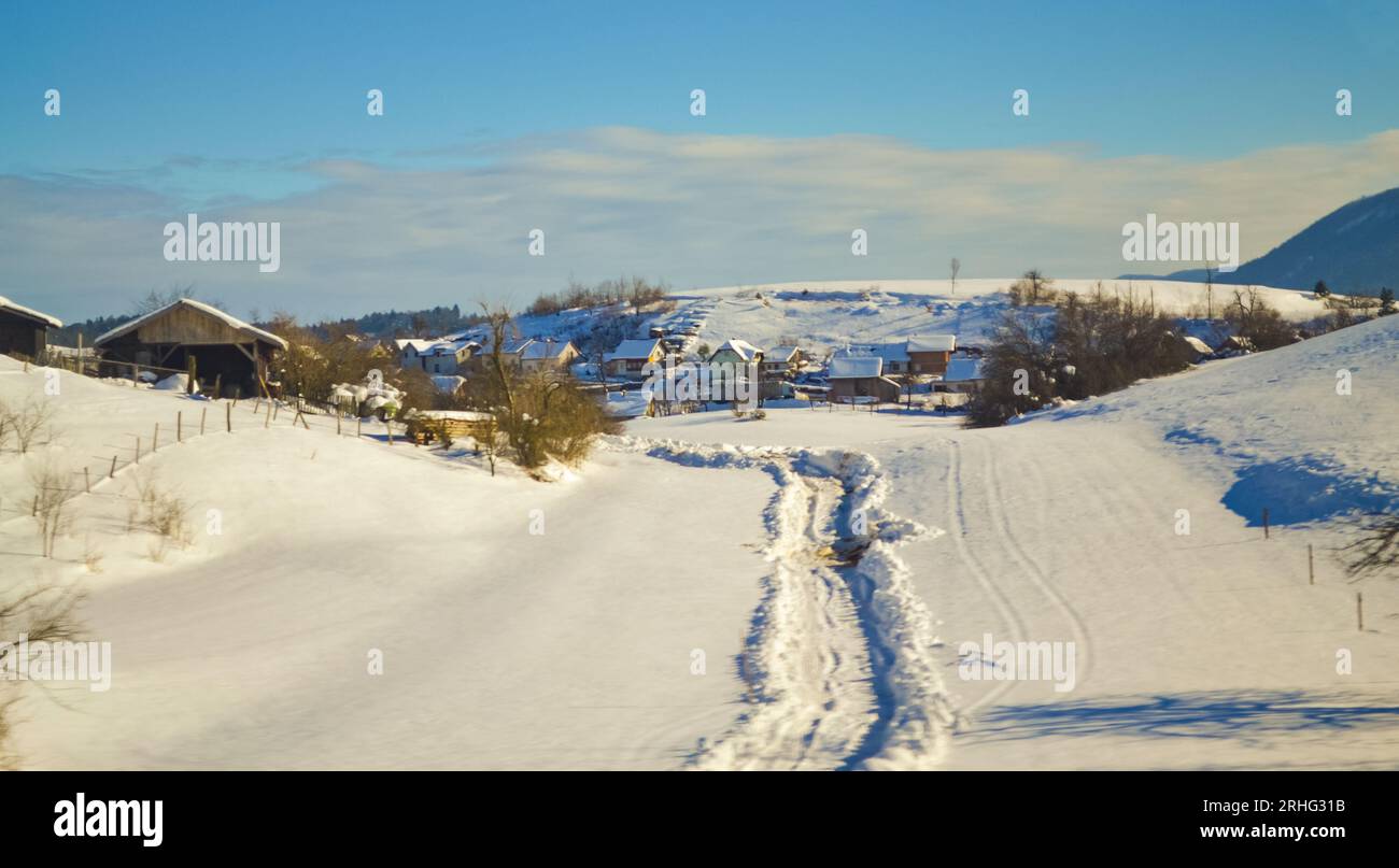 Slovenian village on sunny winter day seen from European route E61 in ...