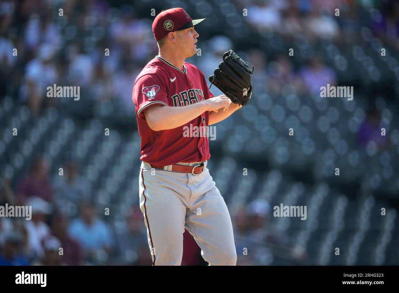 Arizona Diamondbacks relief pitcher Paul Sewald reacts after striking ...