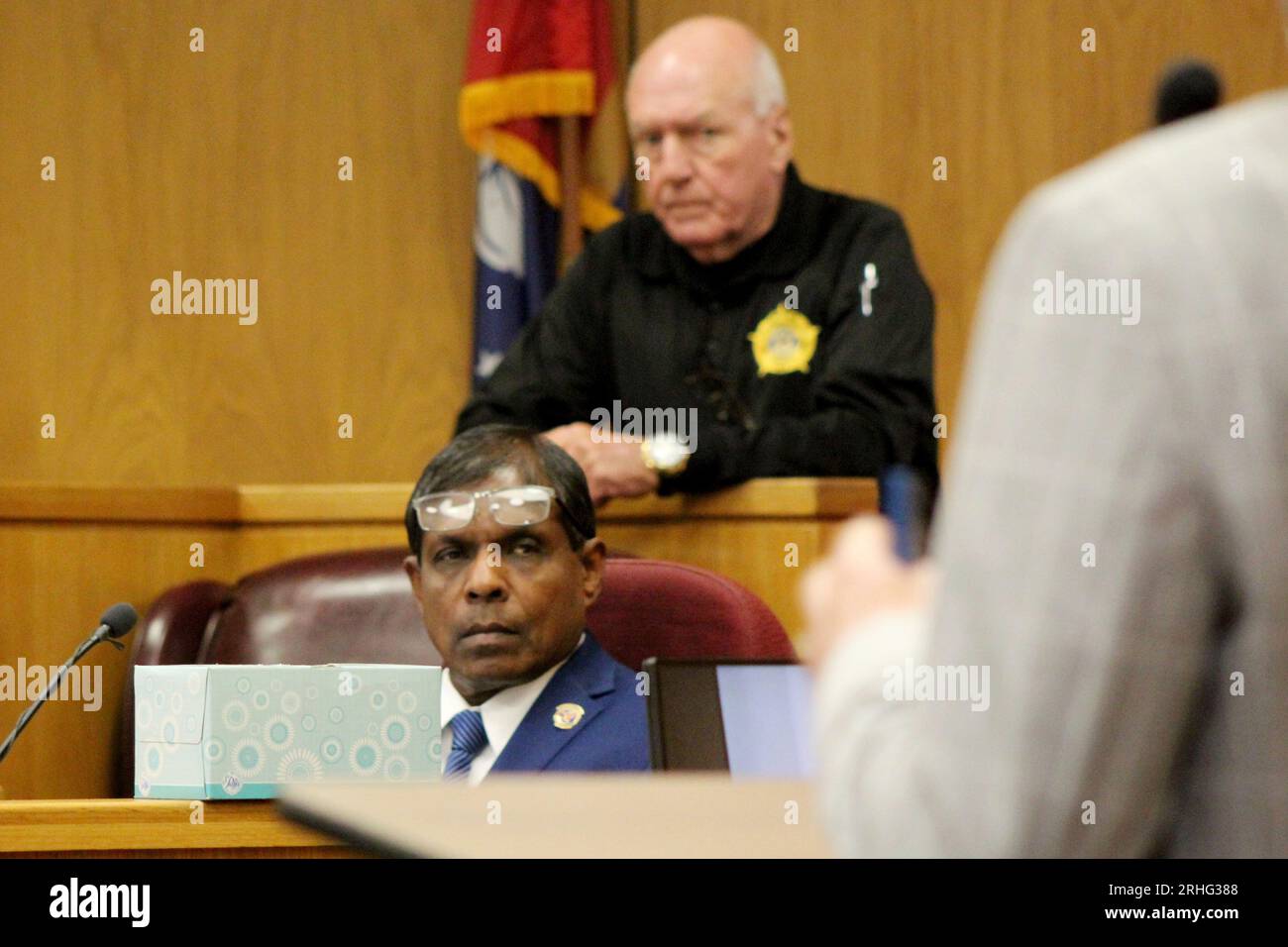 Brookhaven Police Department detective Vincent Fernando, center ...