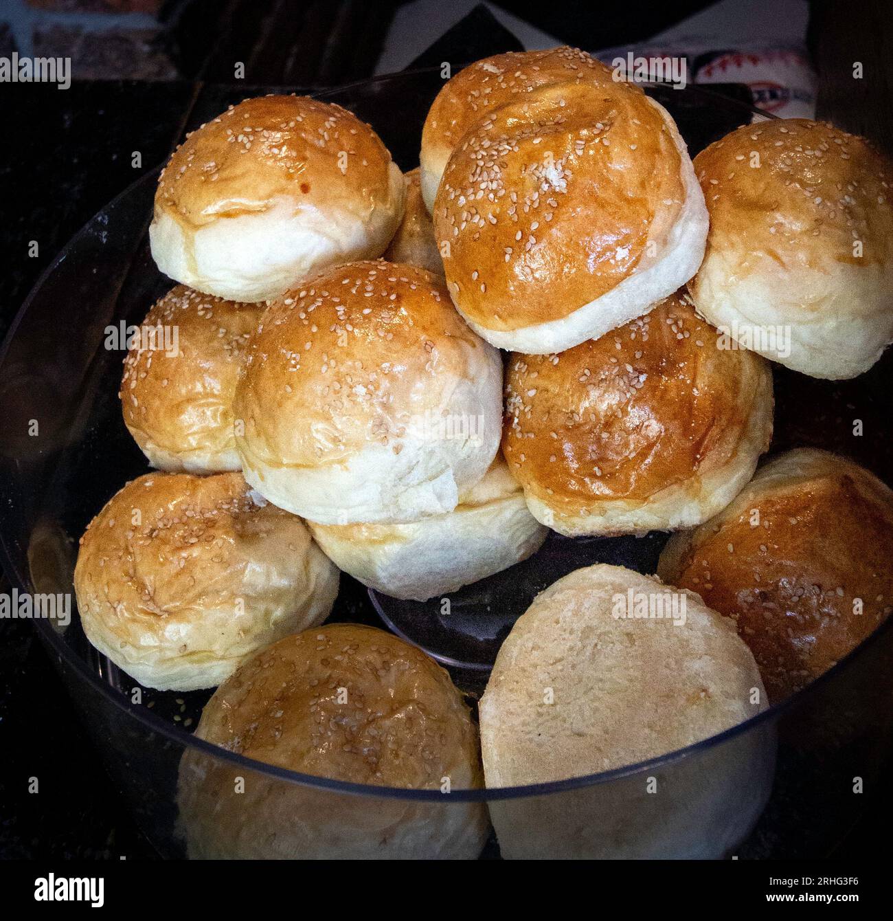 Bun bread in a glass bowl Stock Photo - Alamy