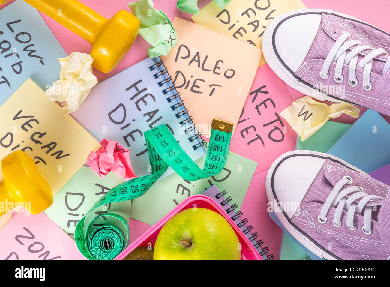 Slimming, fitness flat lay. Diet choice concept with bright handwritten ...