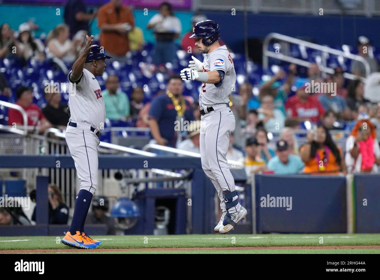 Houston Astros' Alex Bregman, right, celebrates with third base coach ...
