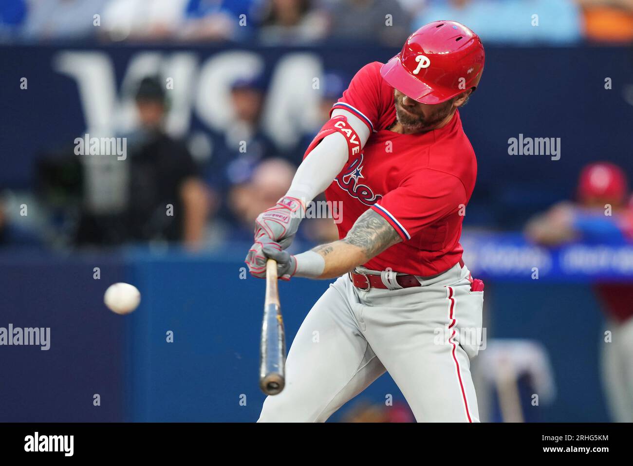 Philadelphia Phillies' Jake Cave (44) hits an RBI sacrifice fly against ...