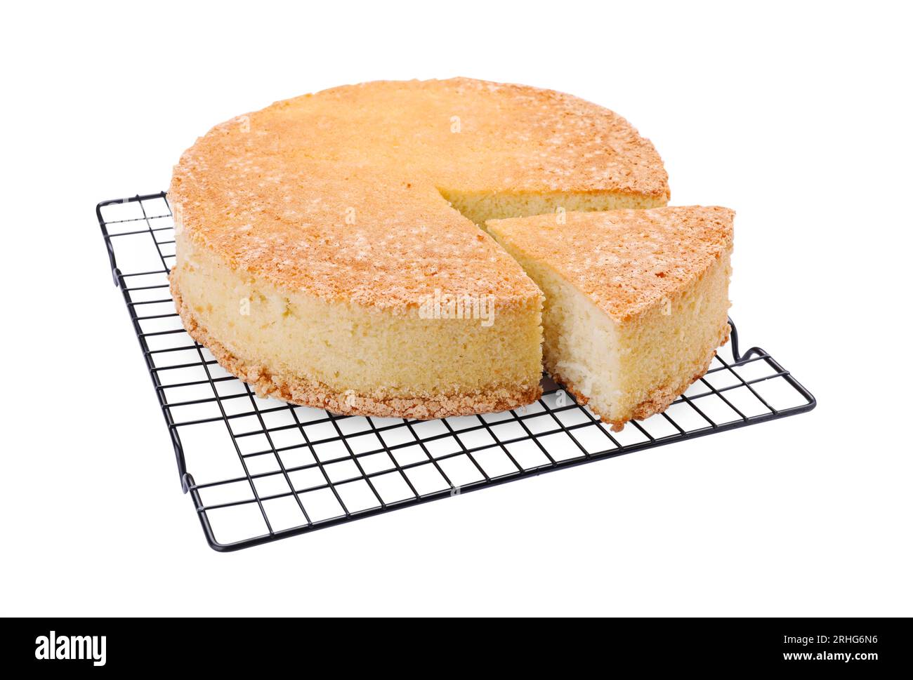 Baking rack with tasty sponge cake isolated on white Stock Photo - Alamy