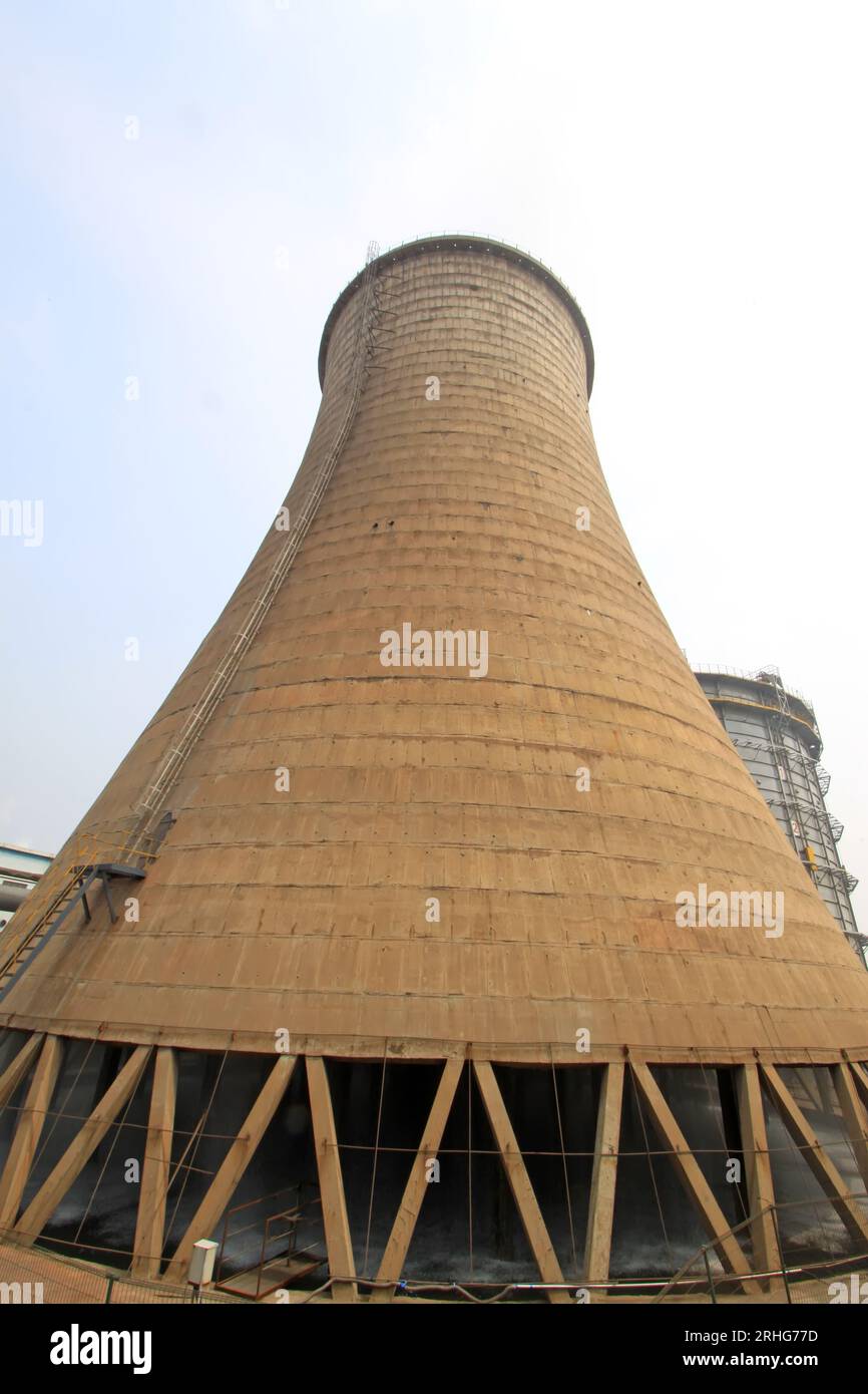 industrial building cooling tower in a factory Stock Photo - Alamy