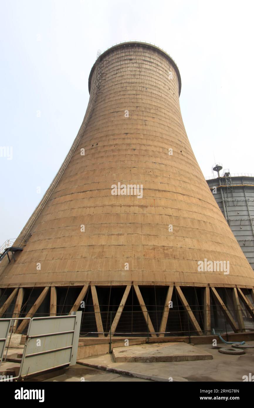 industrial building cooling tower in a factory Stock Photo - Alamy