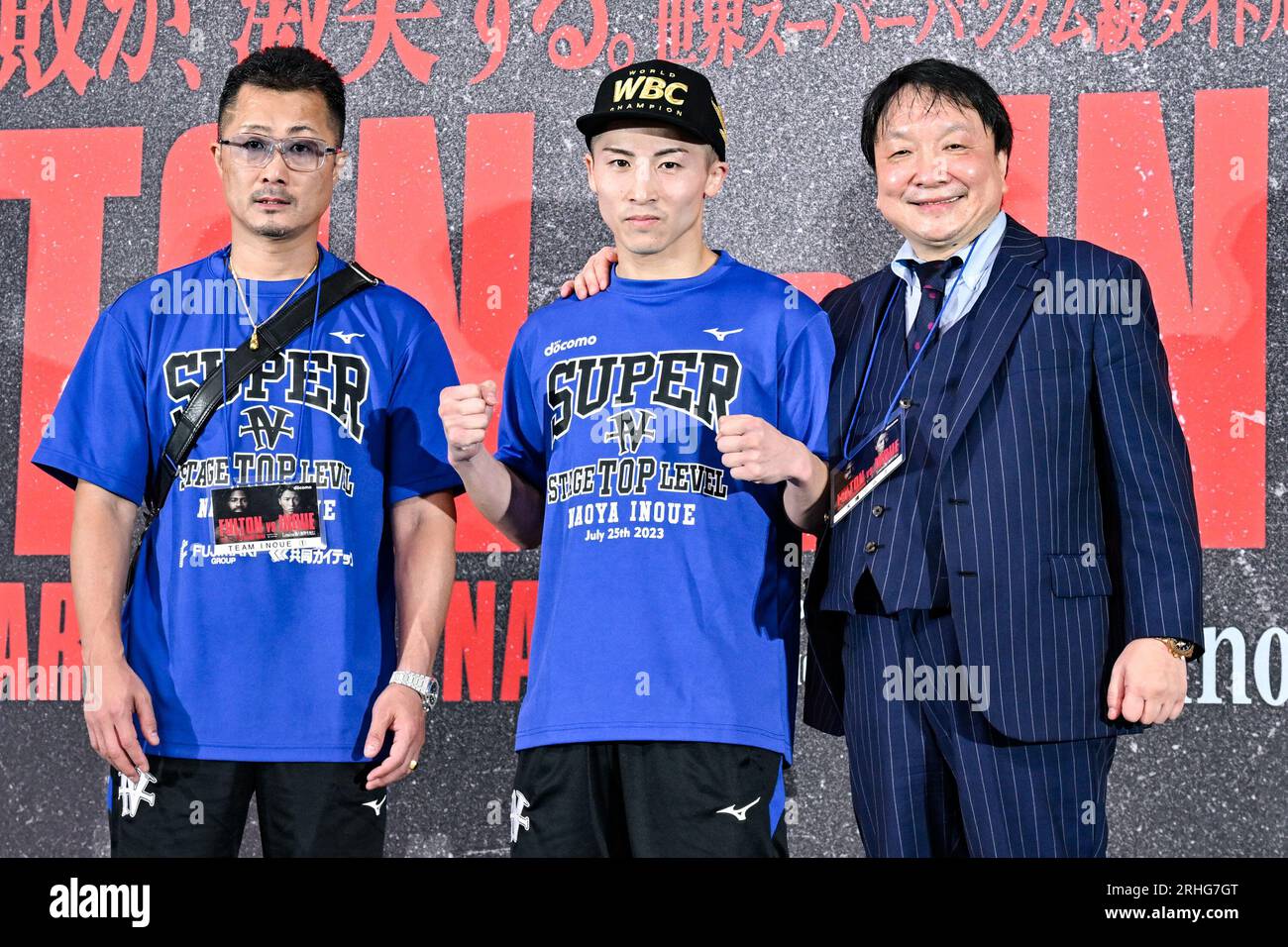 Tokyo, Japan. 25th July, 2023. Japan's Naoya Inoue, center, poses for a ...