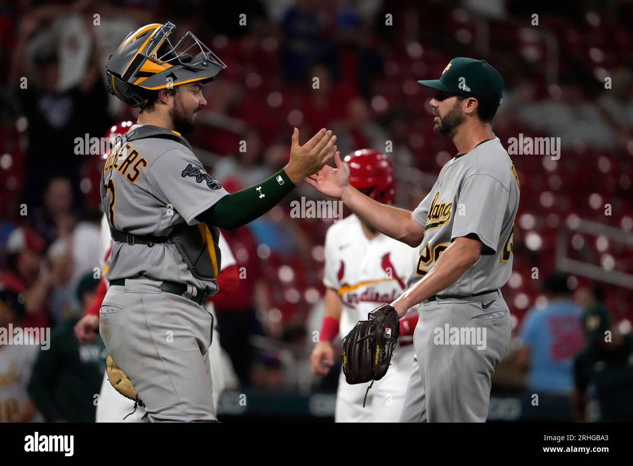 Oakland Athletics catcher Shea Langeliers, left, and relief pitcher ...
