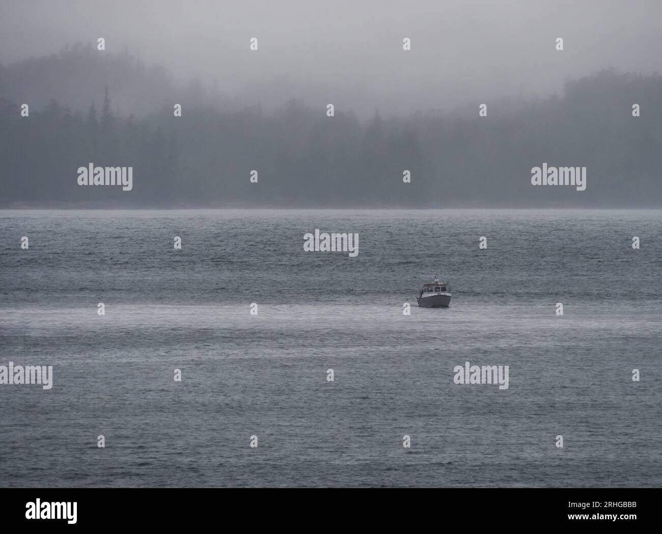 Beautiful scenery of the sea during a foggy day. In the distance you ...