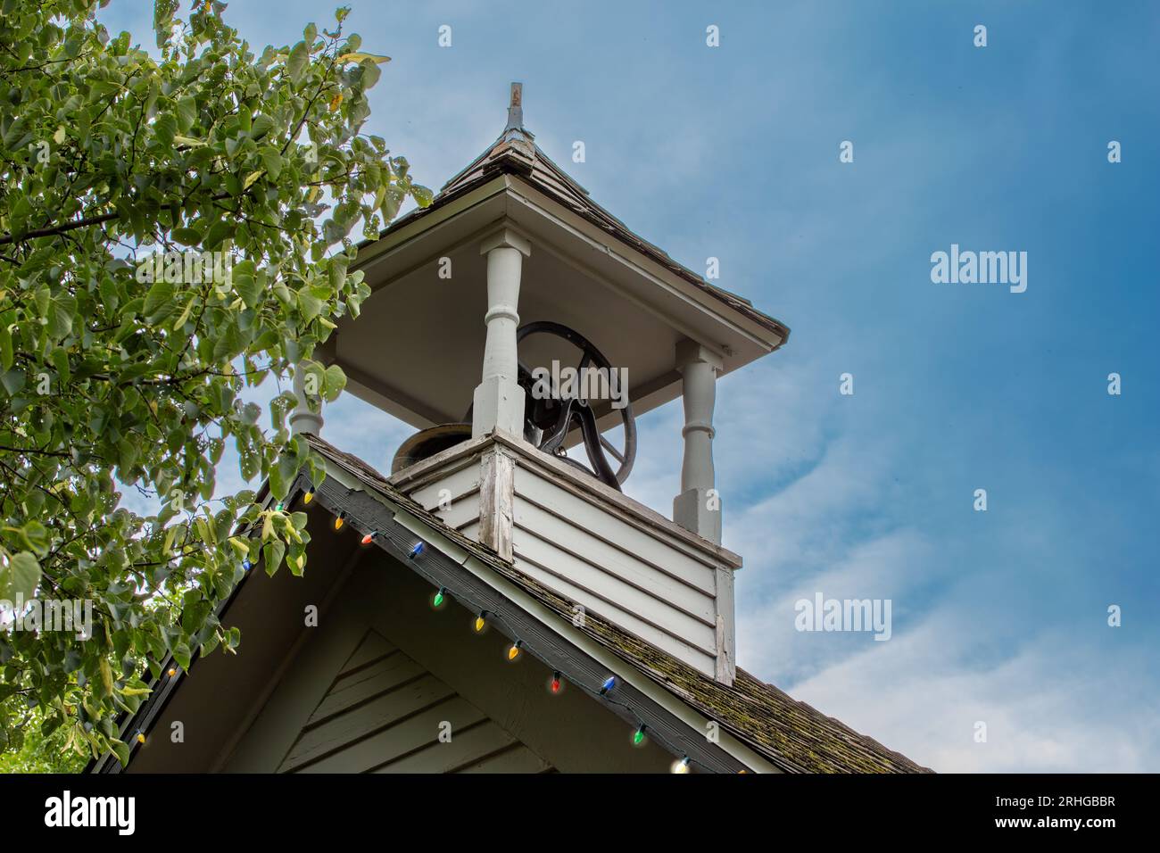 Exterior bell tower on a 19th century one-room wood frame country ...