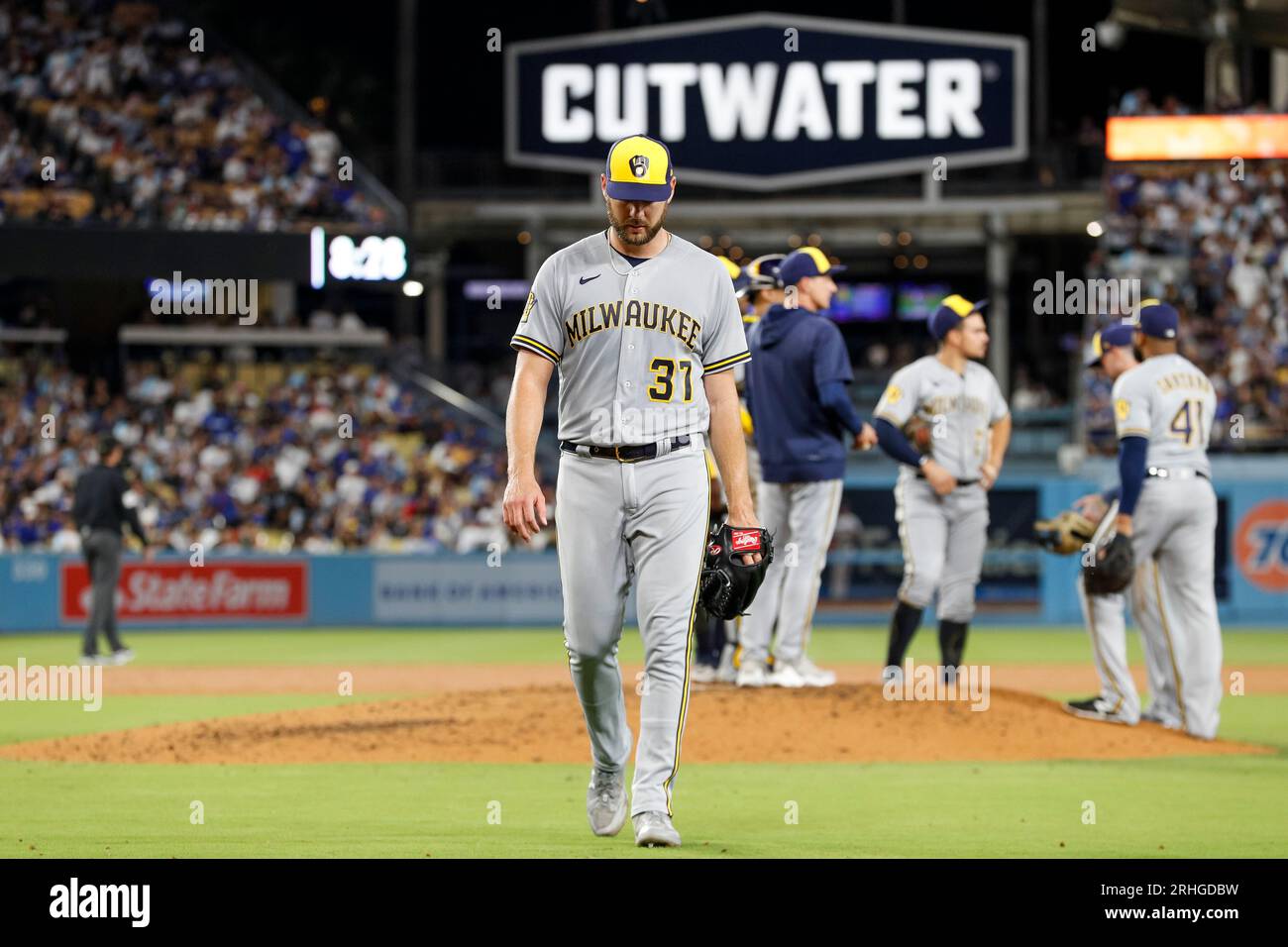 Milwaukee Brewers starting pitcher Adrian Houser (37) exits the game ...