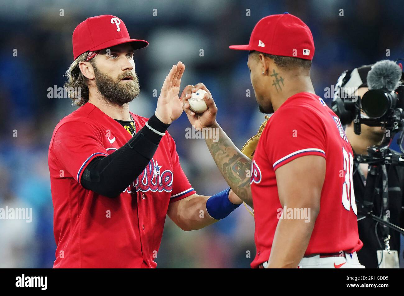 Philadelphia Phillies' Bryce Harper, left, and Gregory Soto celebrate after defeating the ...