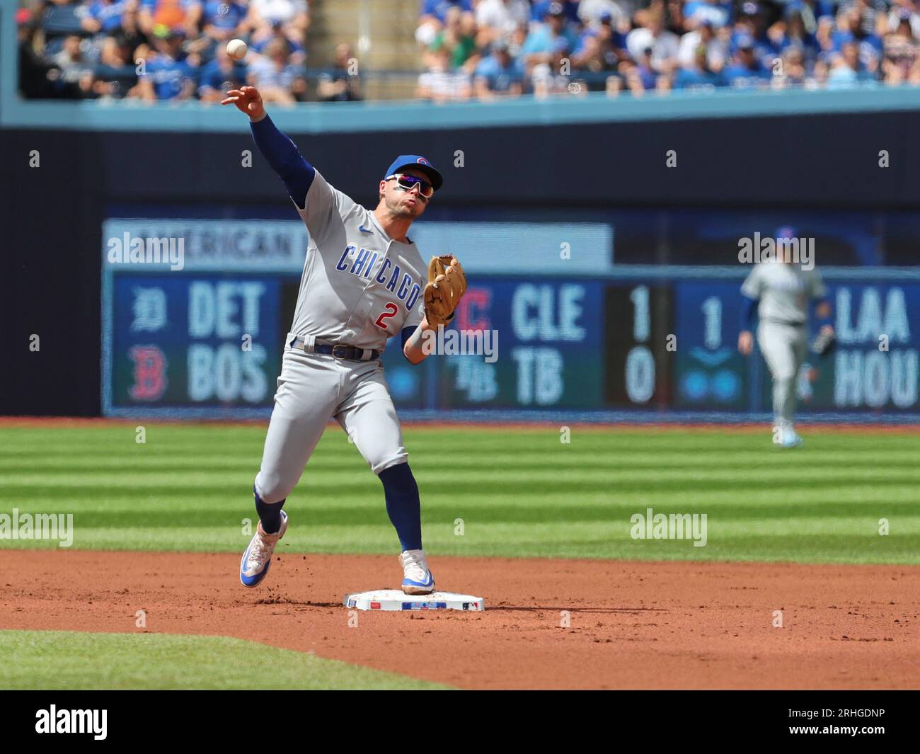Chicago Cubs second baseman Nico Hoerner (2) throws to first base to ...
