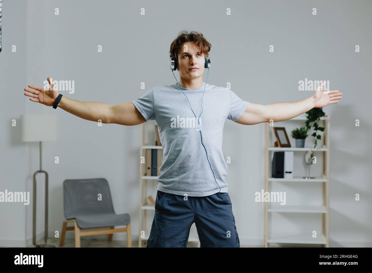 man home training lifestyle healthy sport activity strength gray headphone indoor Stock Photo ...