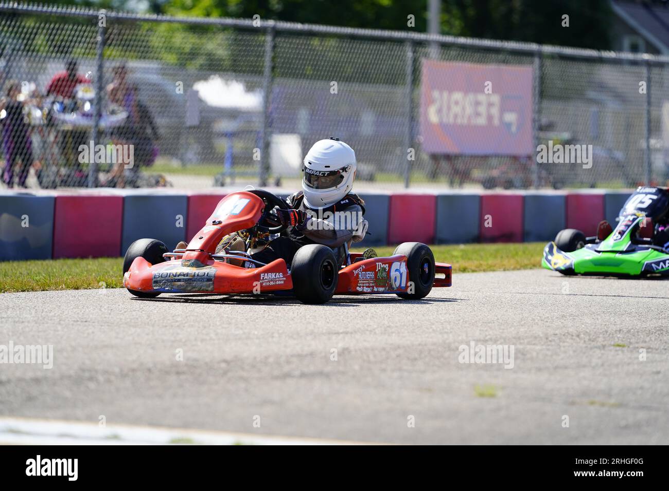 Adult go-kart drivers raced in national races at Badger Kart club Wolf ...