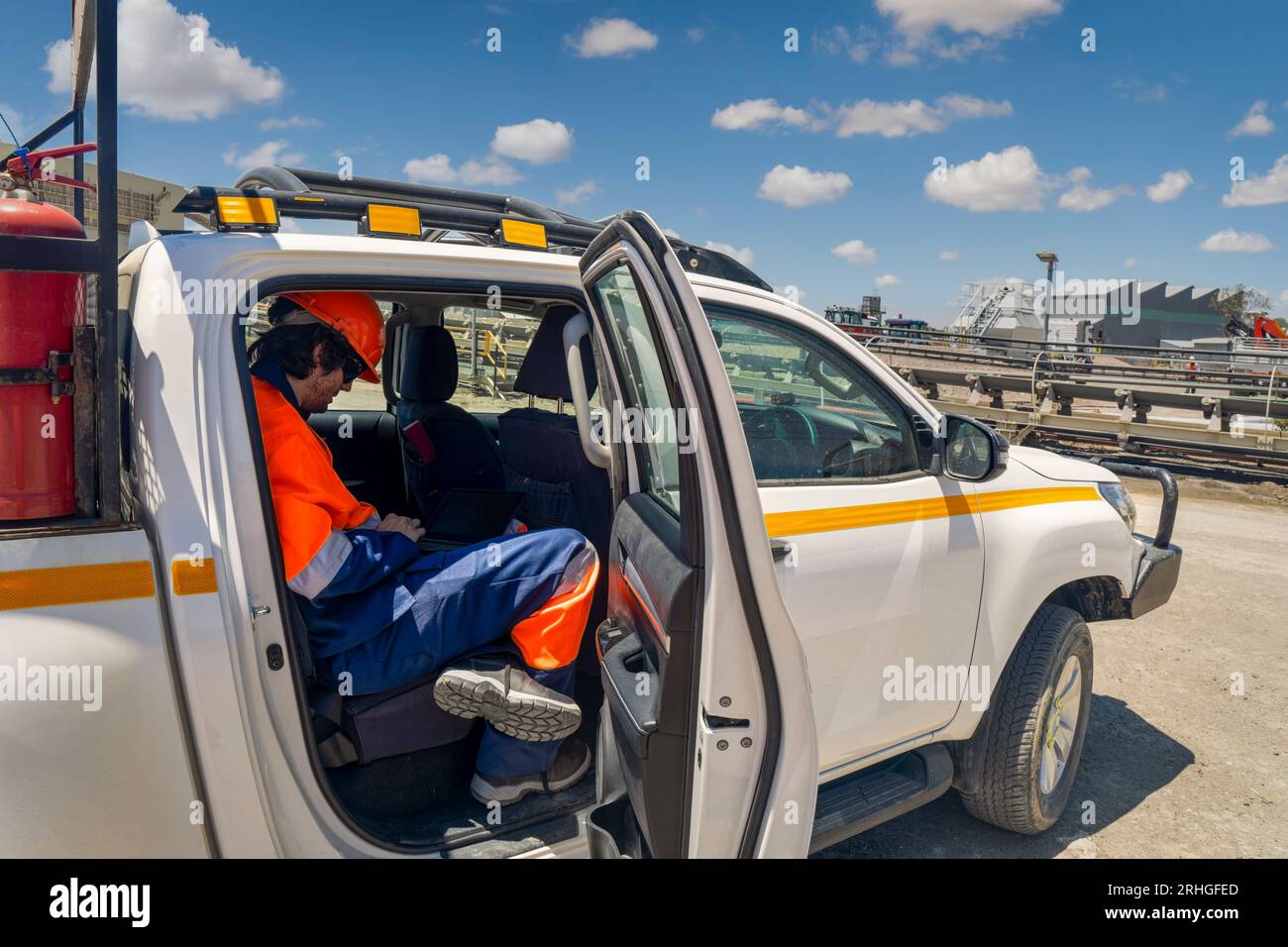 diamond mine processing plant, primary scrubbing, worker in a 4x4 ...