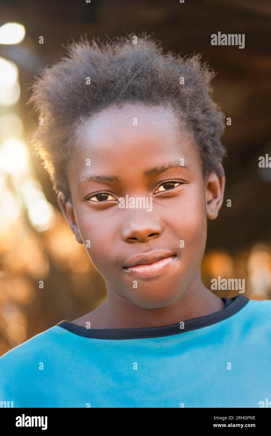 african girl in the village, outdoors portrait in the yard with the ...