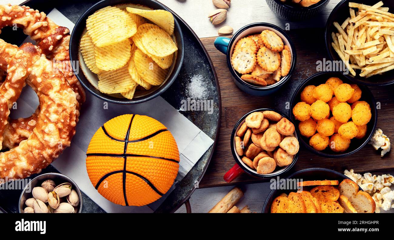Set of various basketball fans and stadium snacks, chips, sauces on a ...