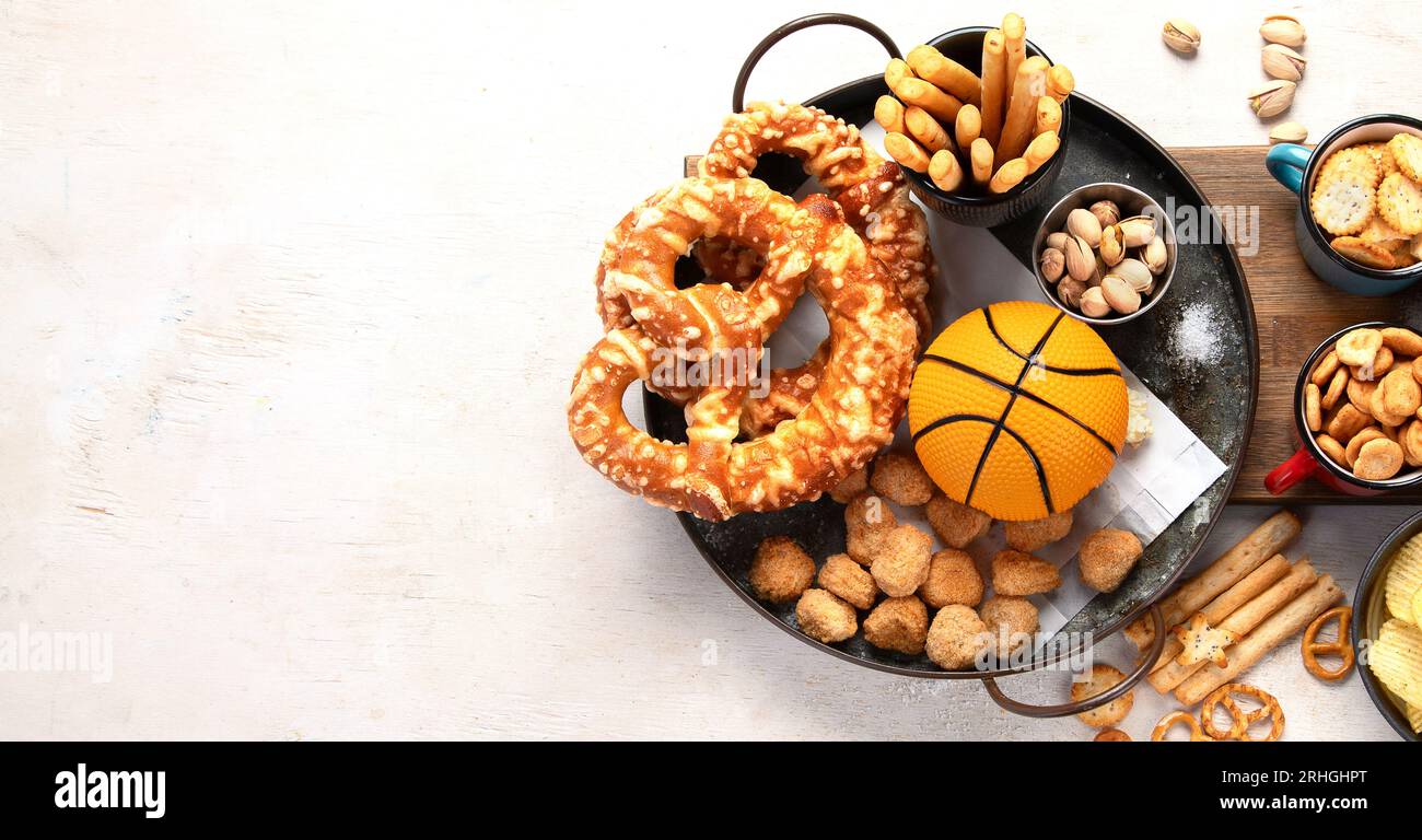 Set of various basketball fans and stadium snacks, chips, sauces on a ...