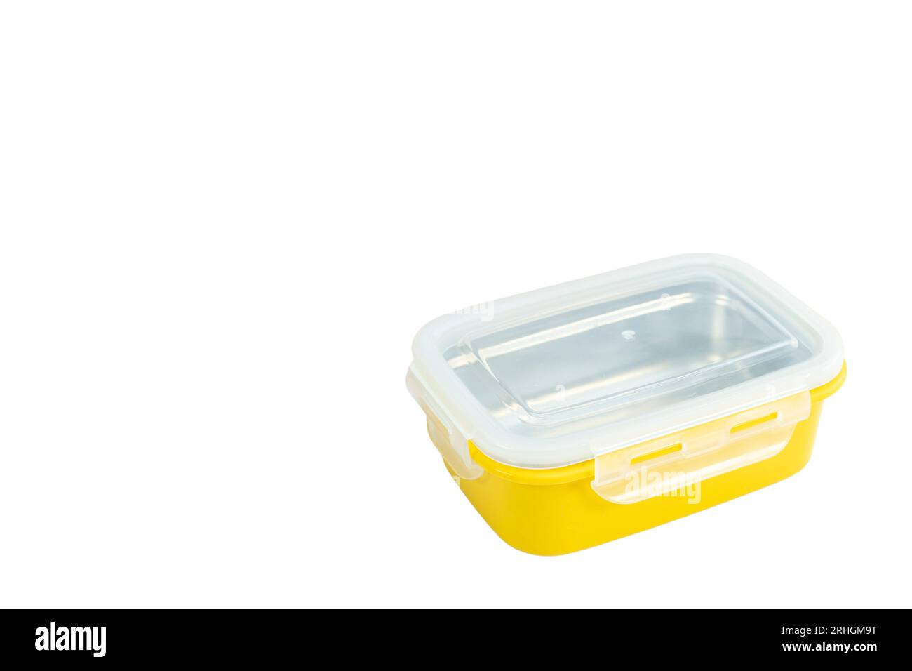 Yellow closed plastic lunch box case isolated on a white background ...