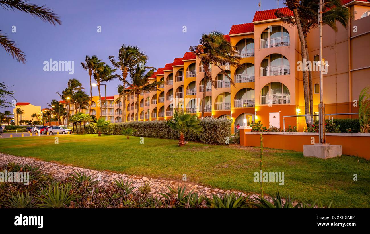 Eagle Beach, Aruba - Local resort building at sunset Stock Photo - Alamy