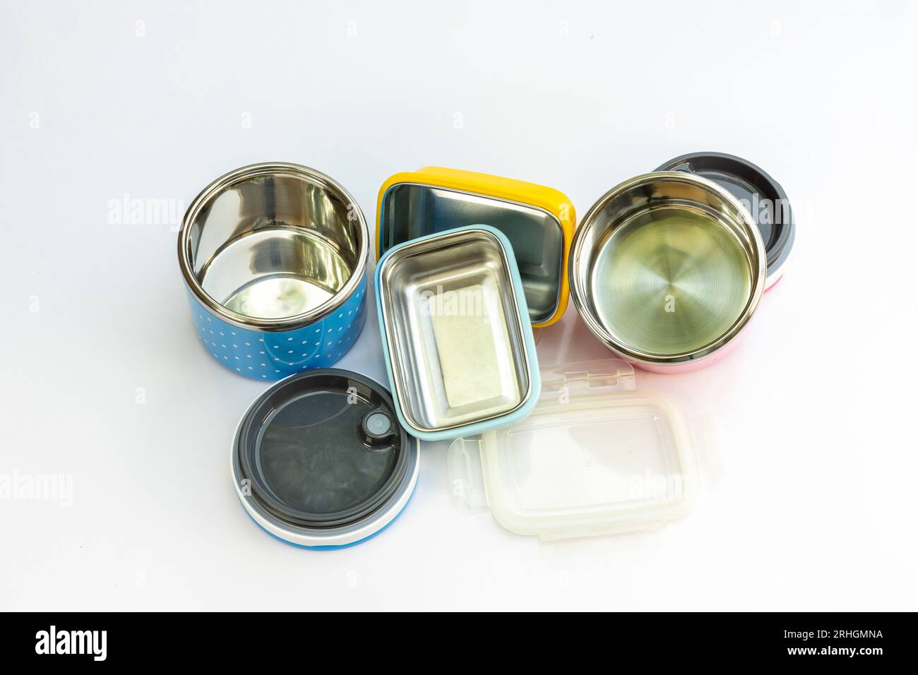 Different color and sizes of lunch boxes on white isolated background ...